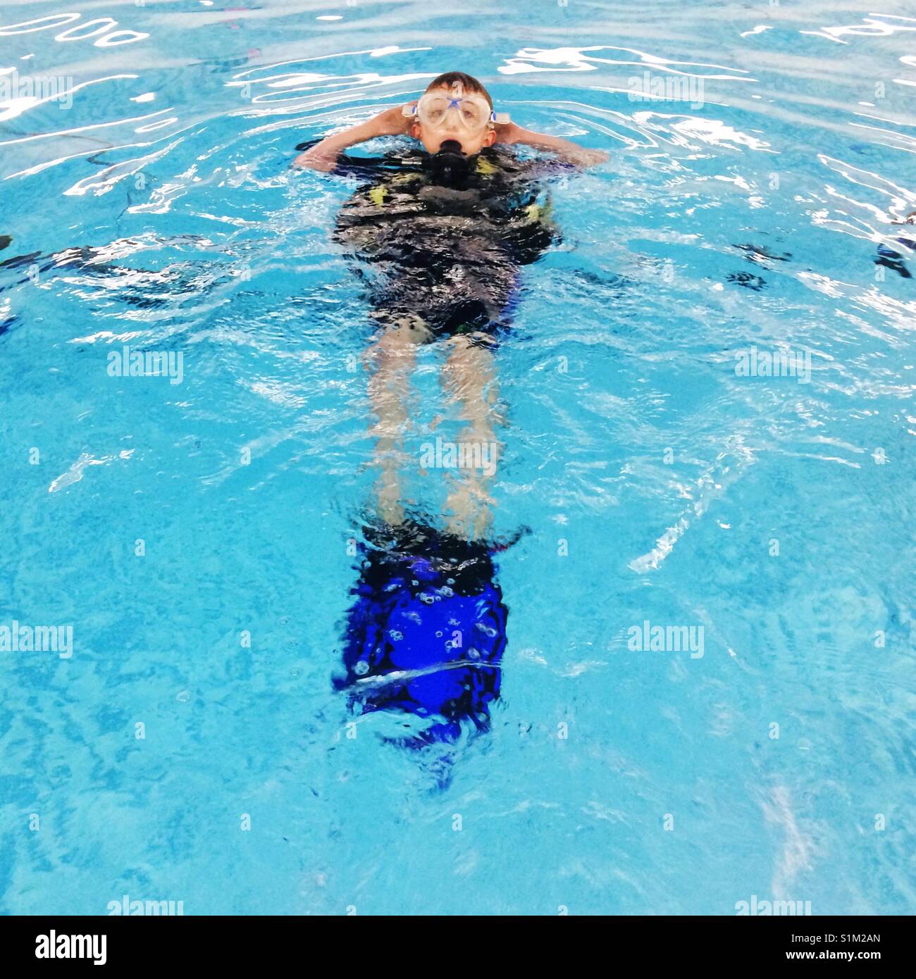 Boy scuba diving in a pool Stock Photo - Alamy