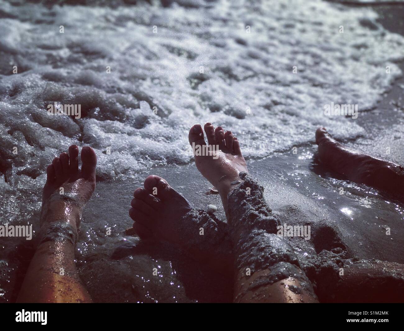 Sandy feet hi-res stock photography and images - Alamy