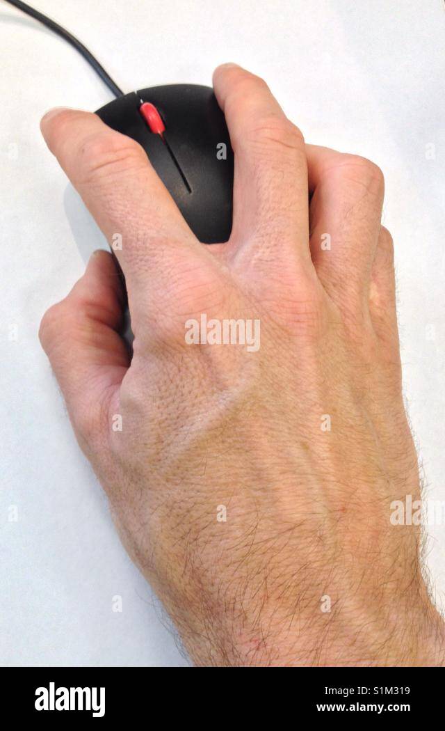 Caucasian man using a mouse with his right hand (portrait orientaion ...