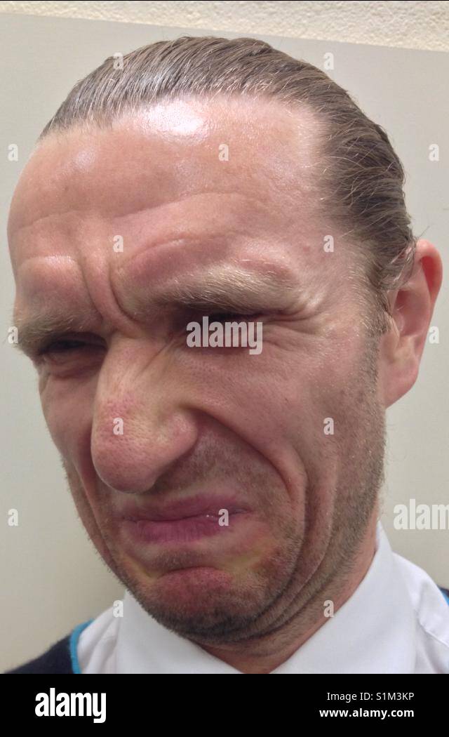 Scrunched up face hi-res stock photography and images - Alamy