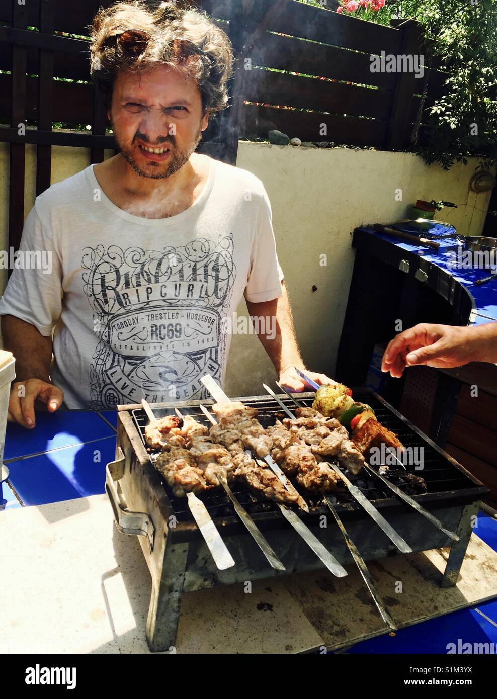 The grill man Stock Photo - Alamy