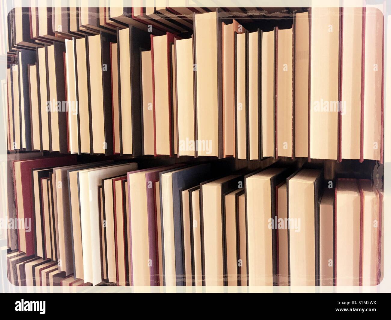 Books neatly placed on the shelves Stock Photo - Alamy