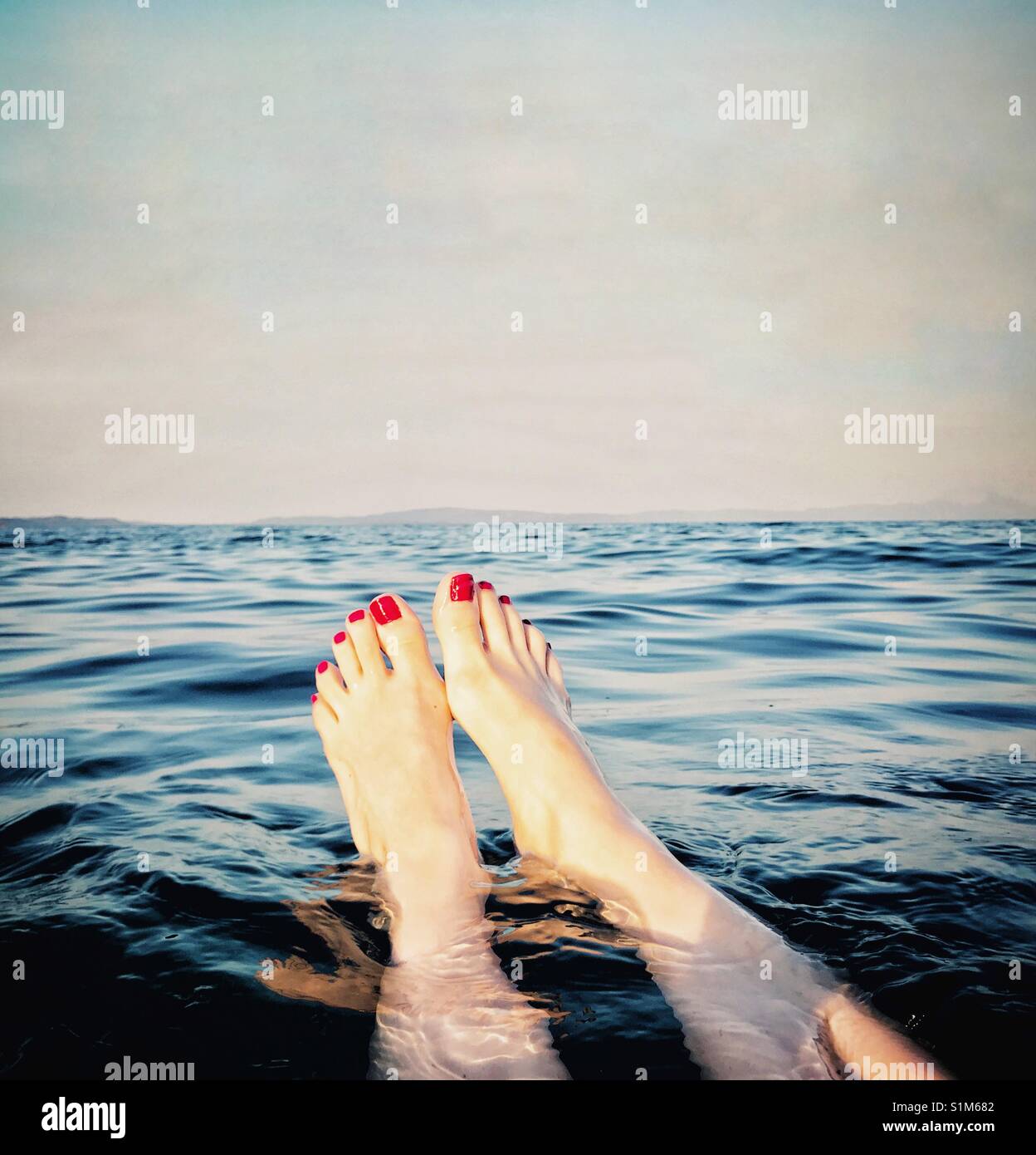 Toes floating hi-res stock photography and images - Alamy