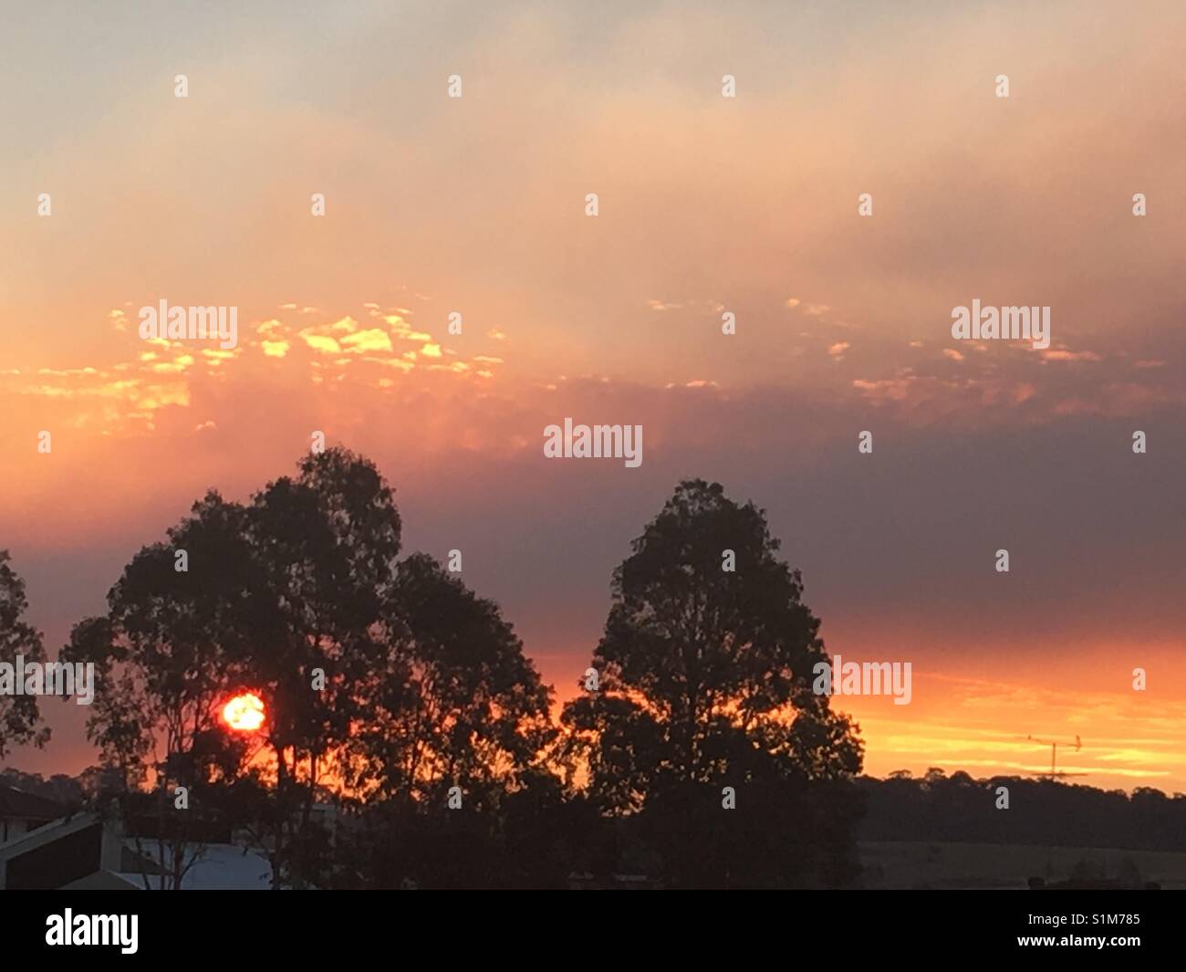 Smoke haze sunset Stock Photo - Alamy