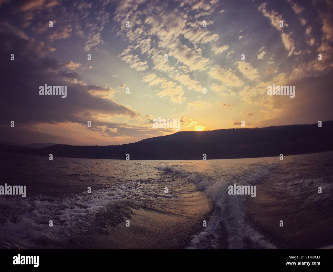 Summer sunset over lake. Wood Lake, British Columbia, Canada. August 12 ...