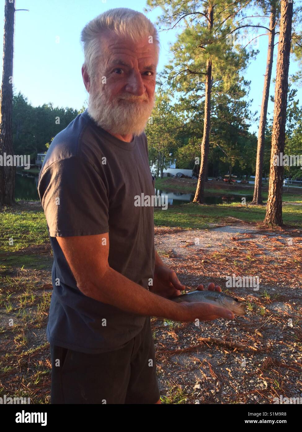 Happy fisherman hi-res stock photography and images - Alamy