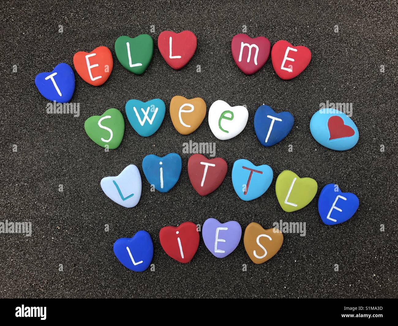 Tell me sweet little lies Stock Photo - Alamy