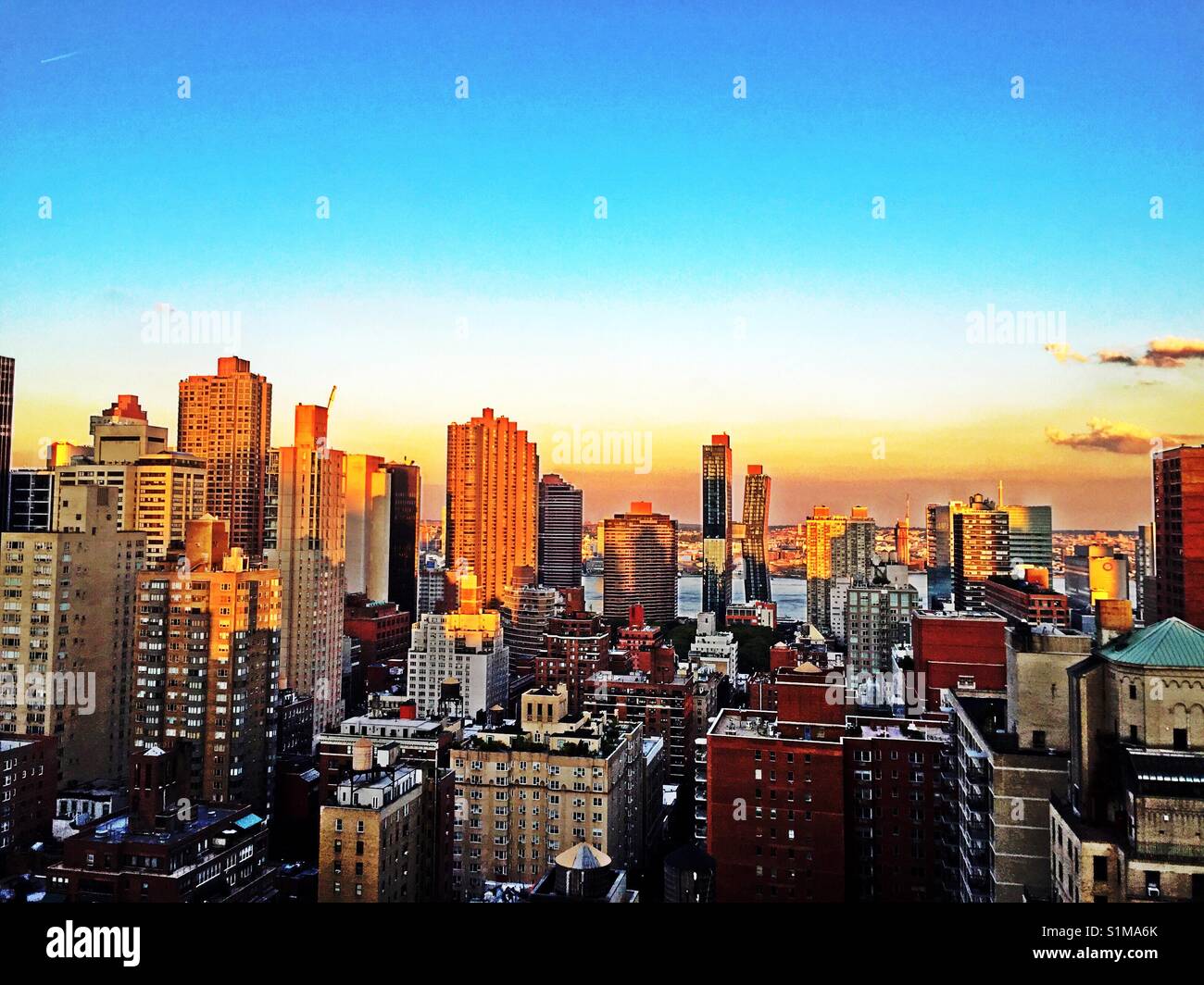 Rooftop view of midtown Manhattan and East River, NYC, USA Stock Photo ...