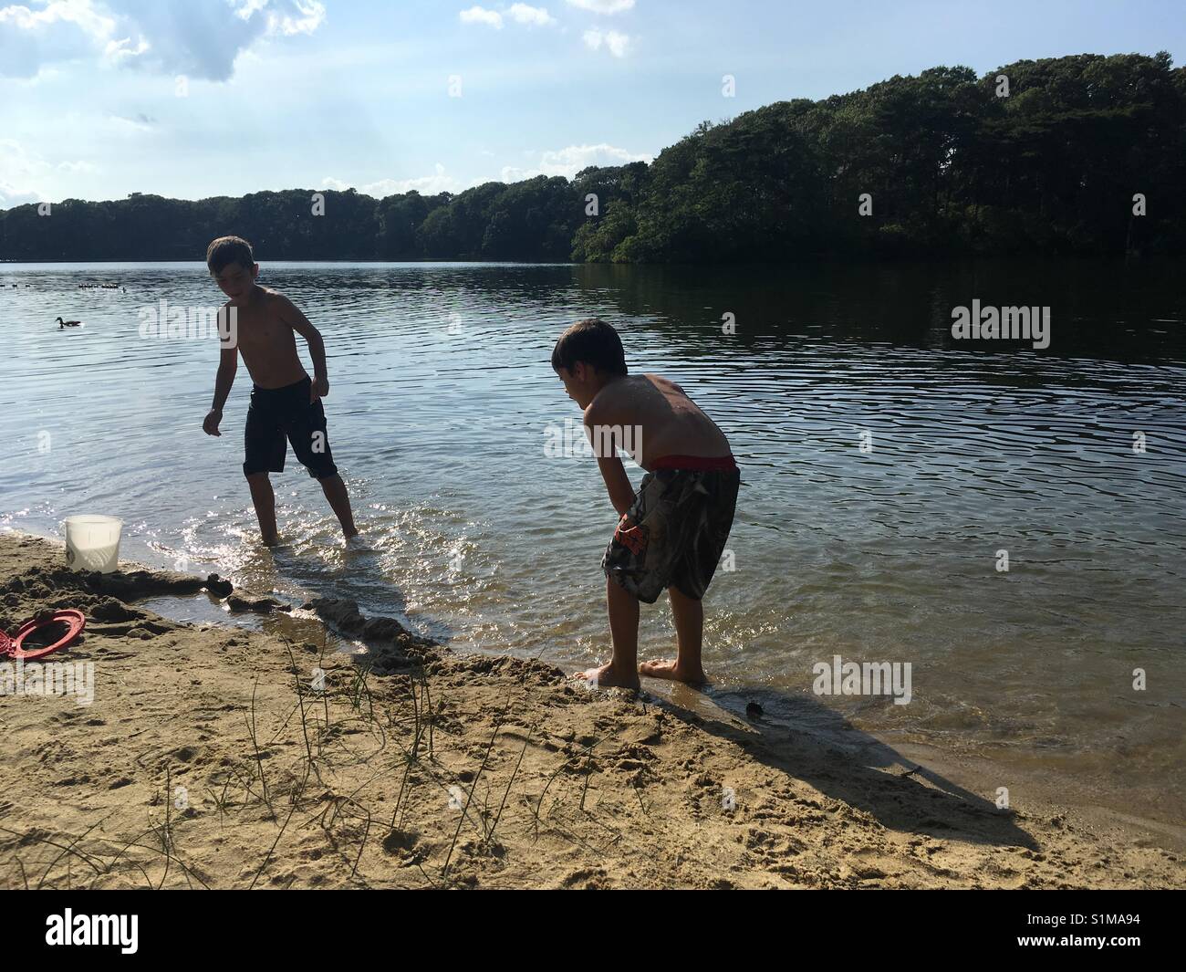 Boys at a lake hi-res stock photography and images - Alamy