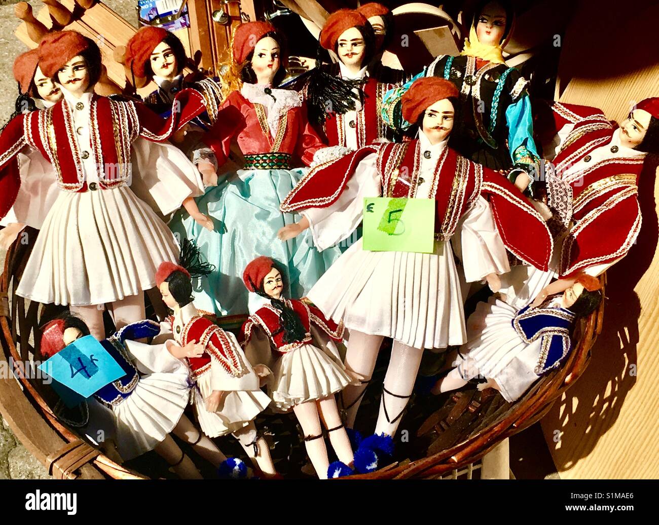 Traditionally dressed Greek dolls sold as souvenirs at the vibrant ...