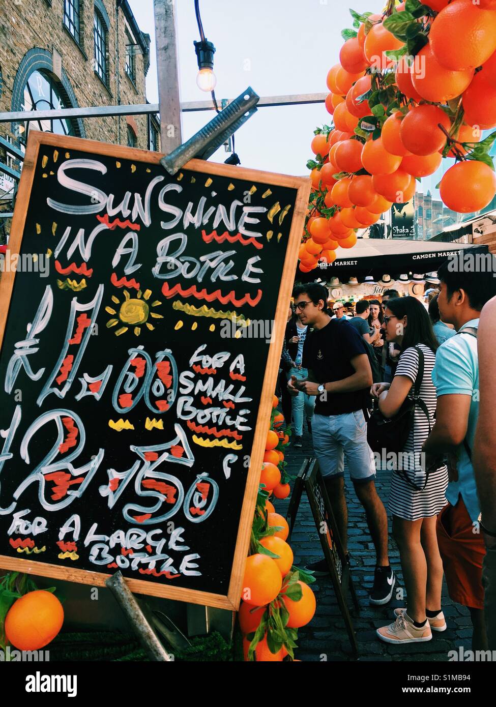 Orange Juice Stall: Camden Town, London Stock Photo - Alamy