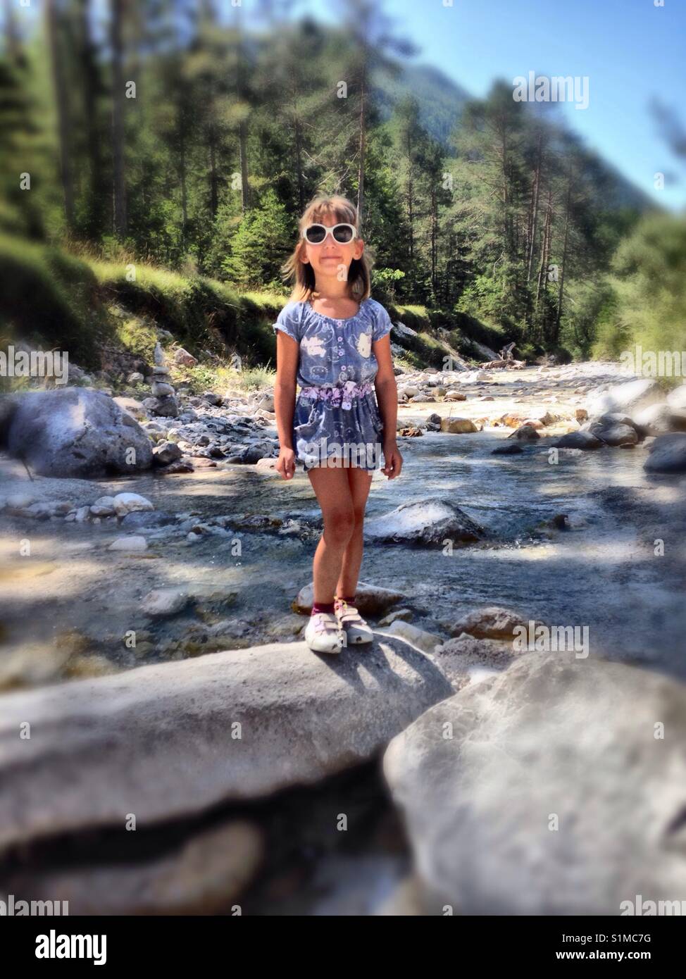 Girl at river Stock Photo - Alamy