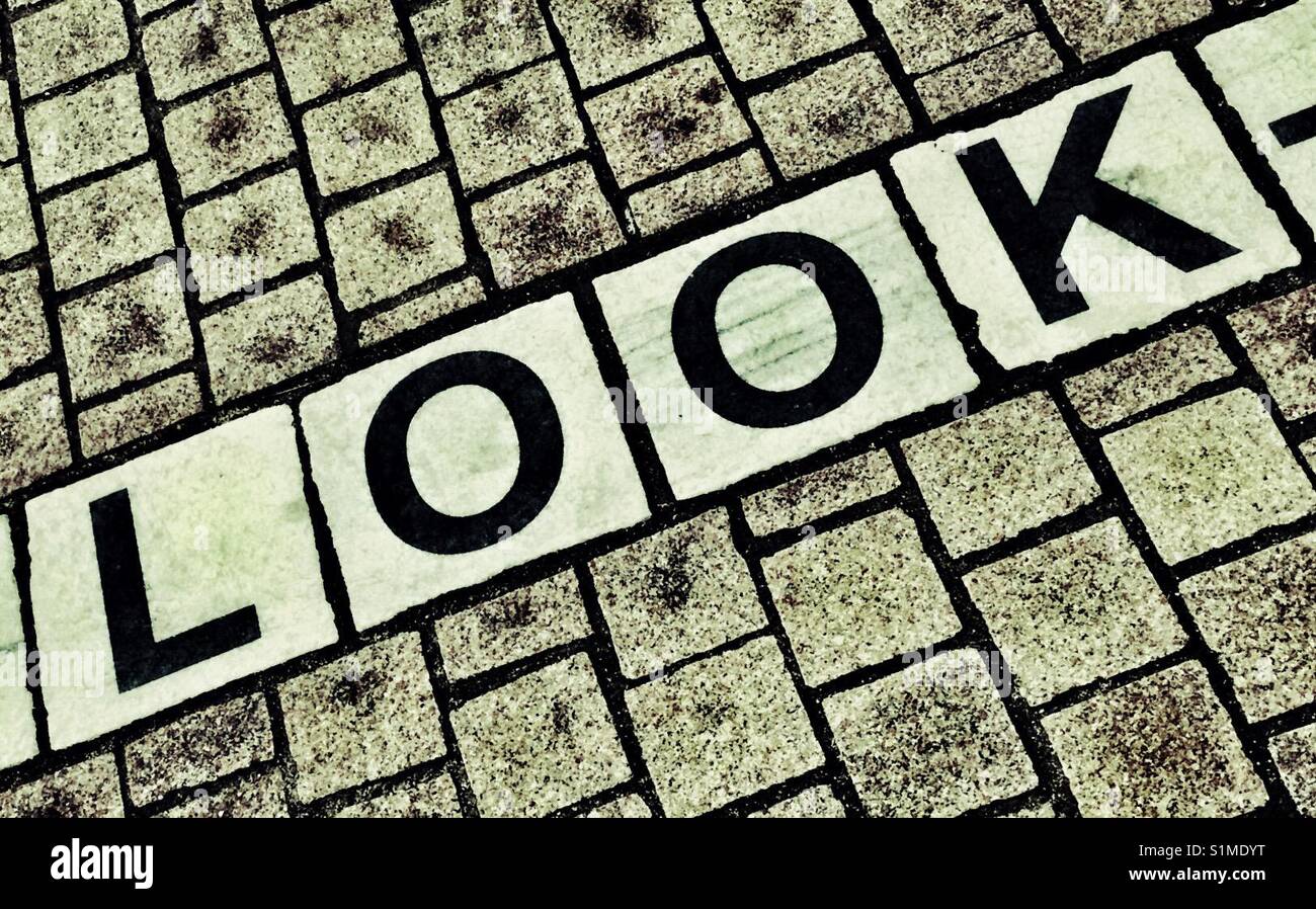 The word Look painted on the pavement Stock Photo - Alamy