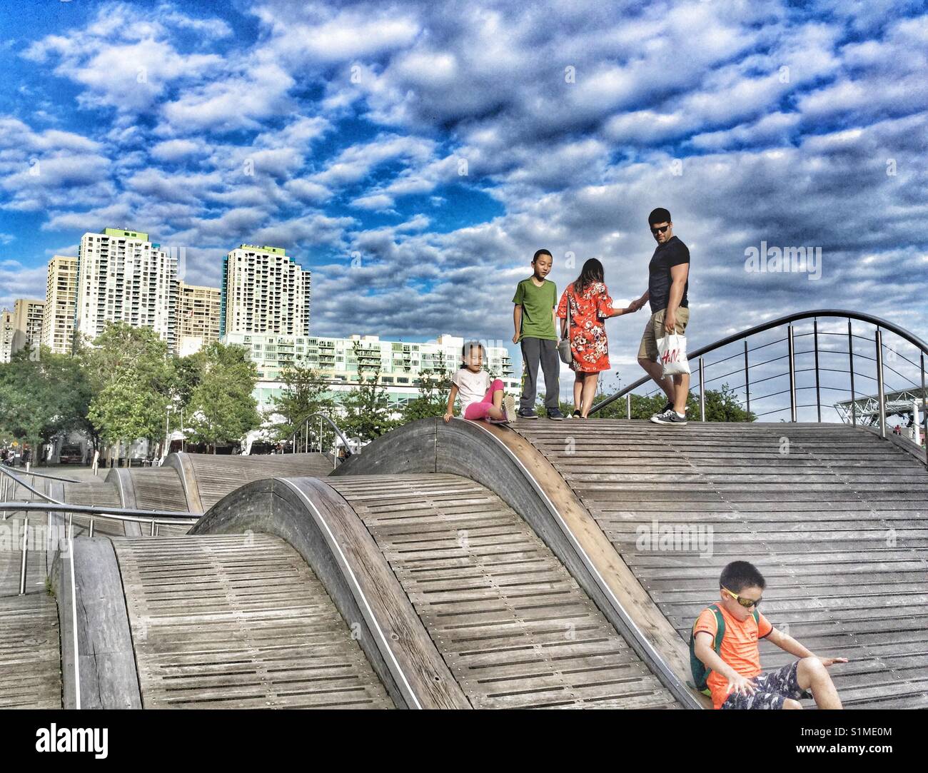People enjoying the wave deck on the waterfront in Toronto Stock Photo ...