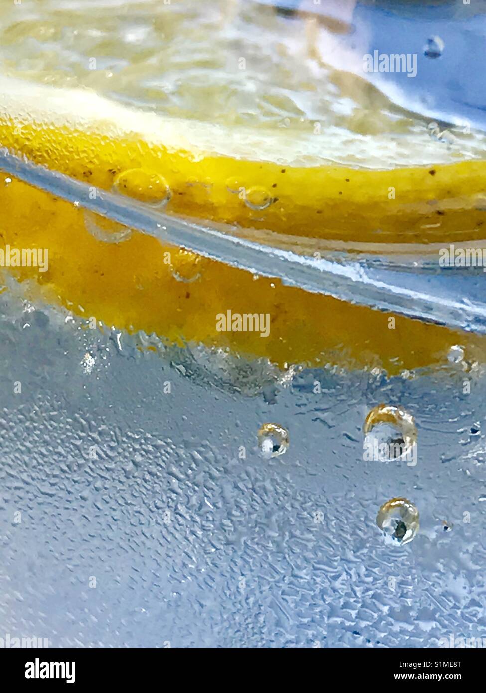 Floating lemon slice hi-res stock photography and images - Alamy