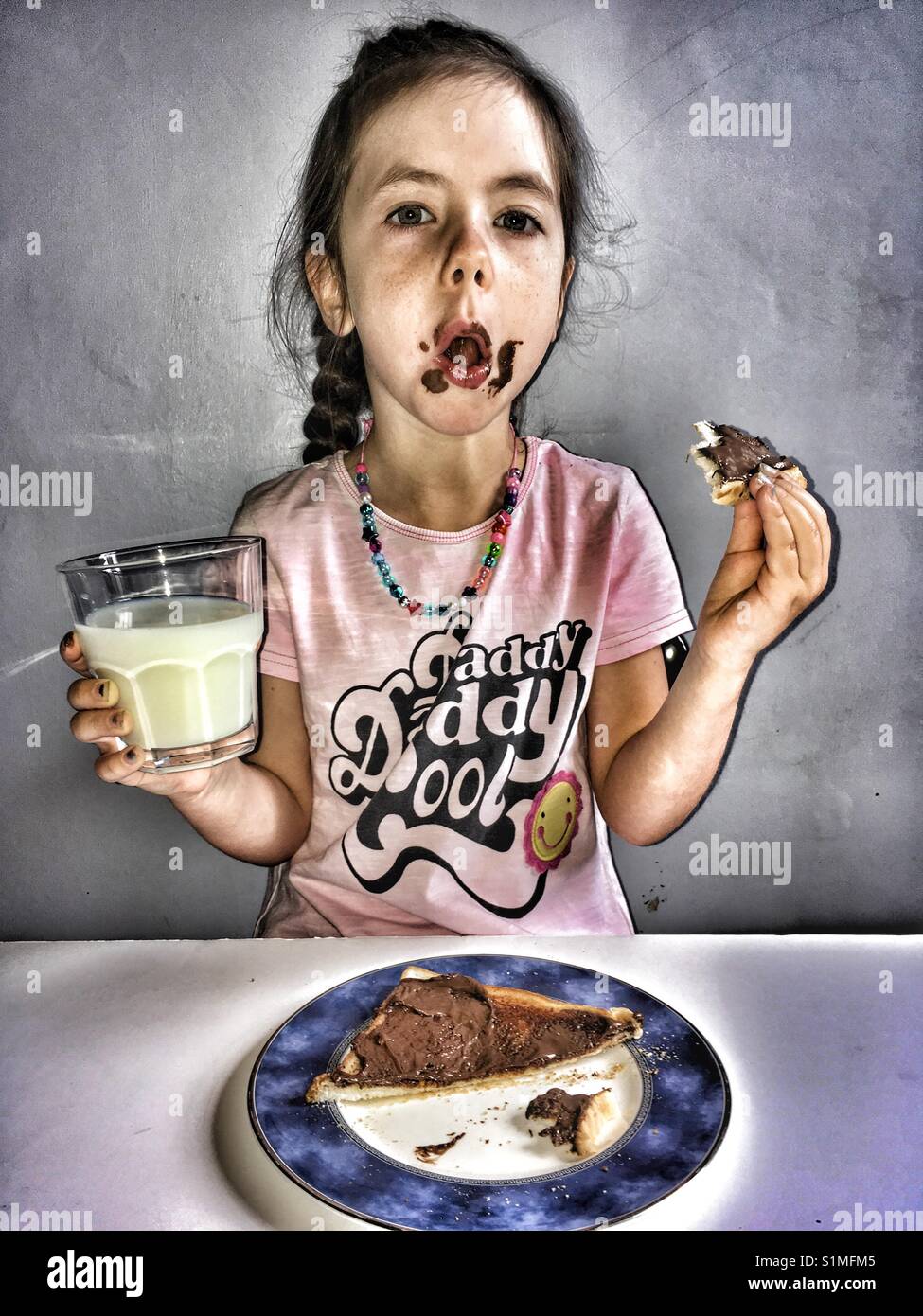 Children eating chocolate messy hi-res stock photography and images - Alamy