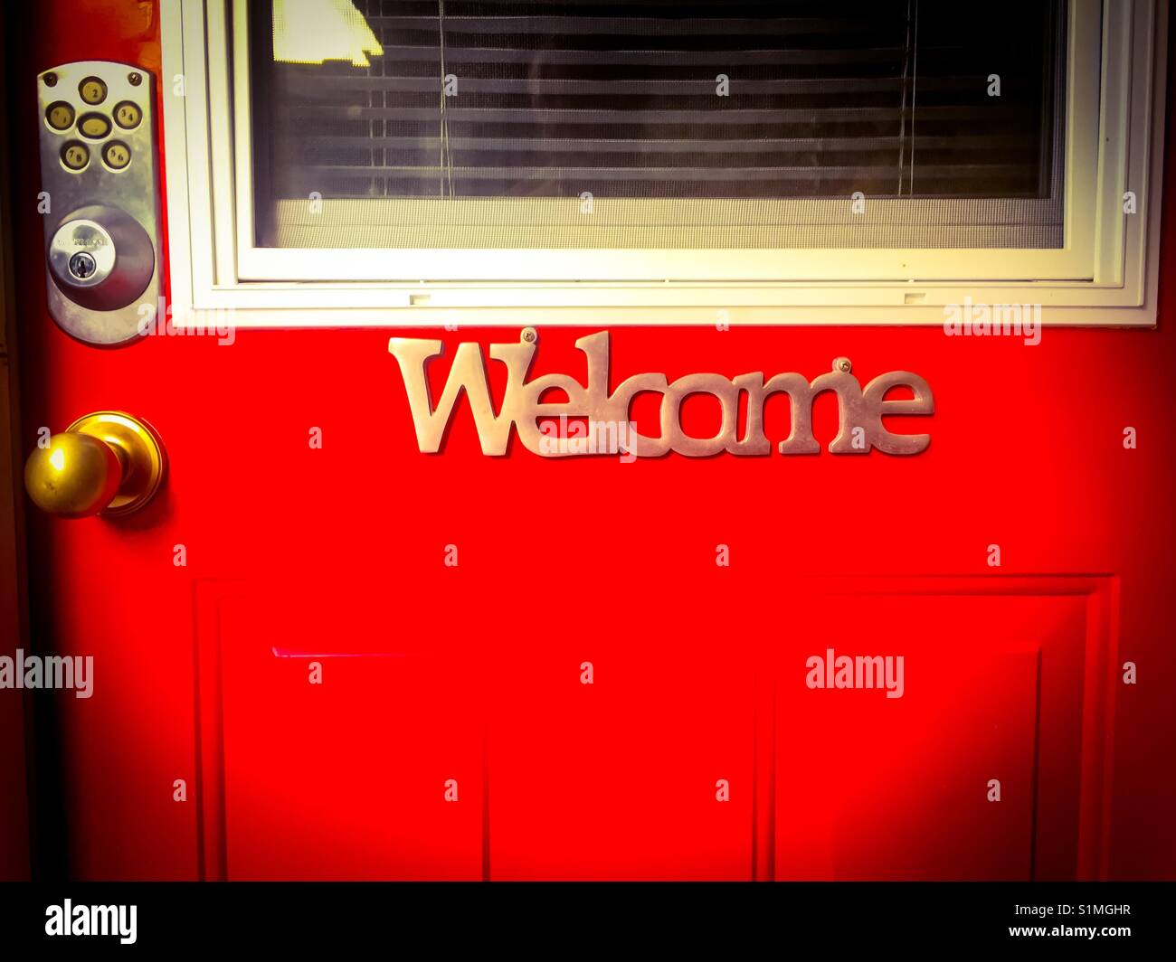 Red welcome door Stock Photo - Alamy
