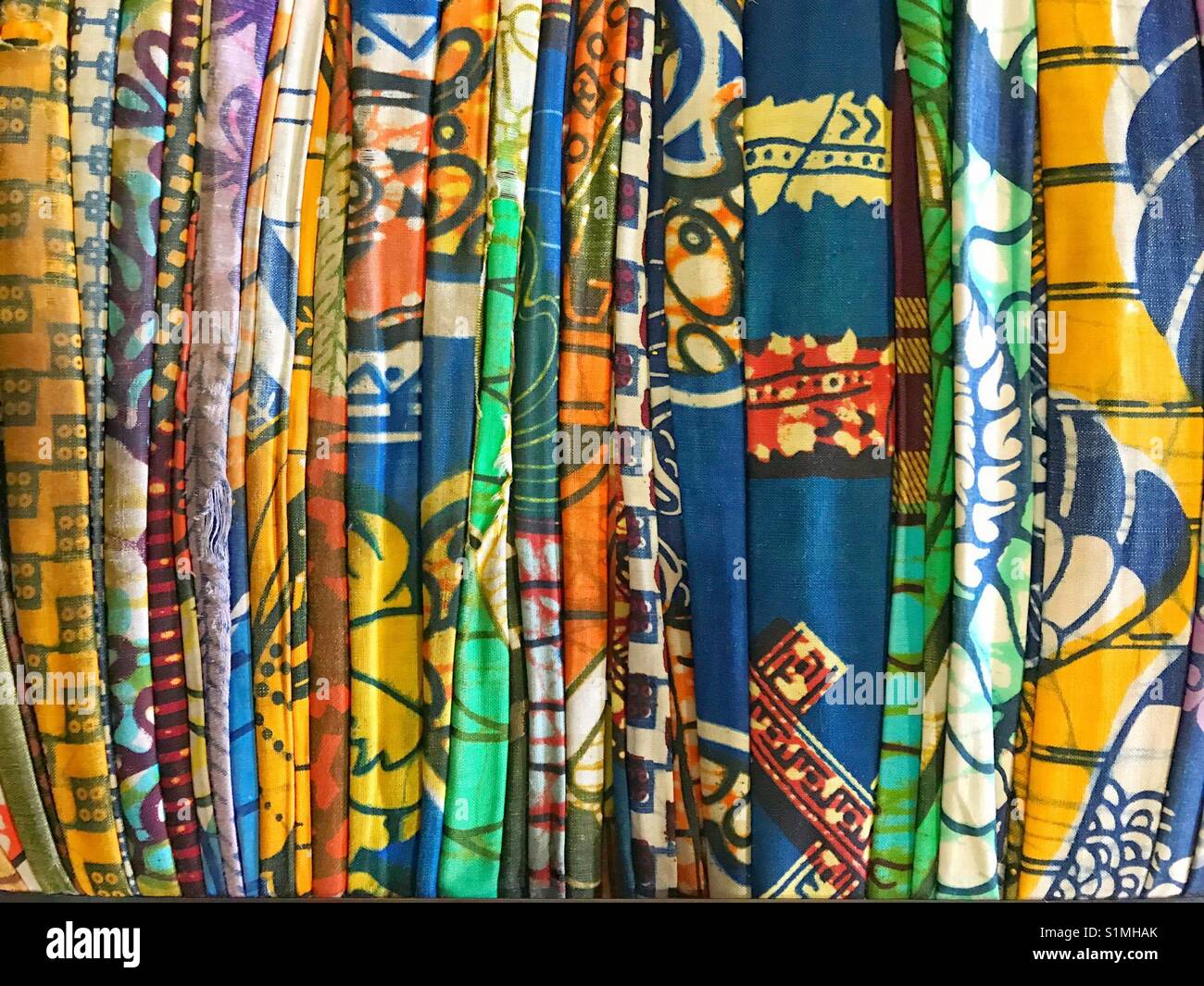 Brightly coloured and patterned fabric Stock Photo - Alamy