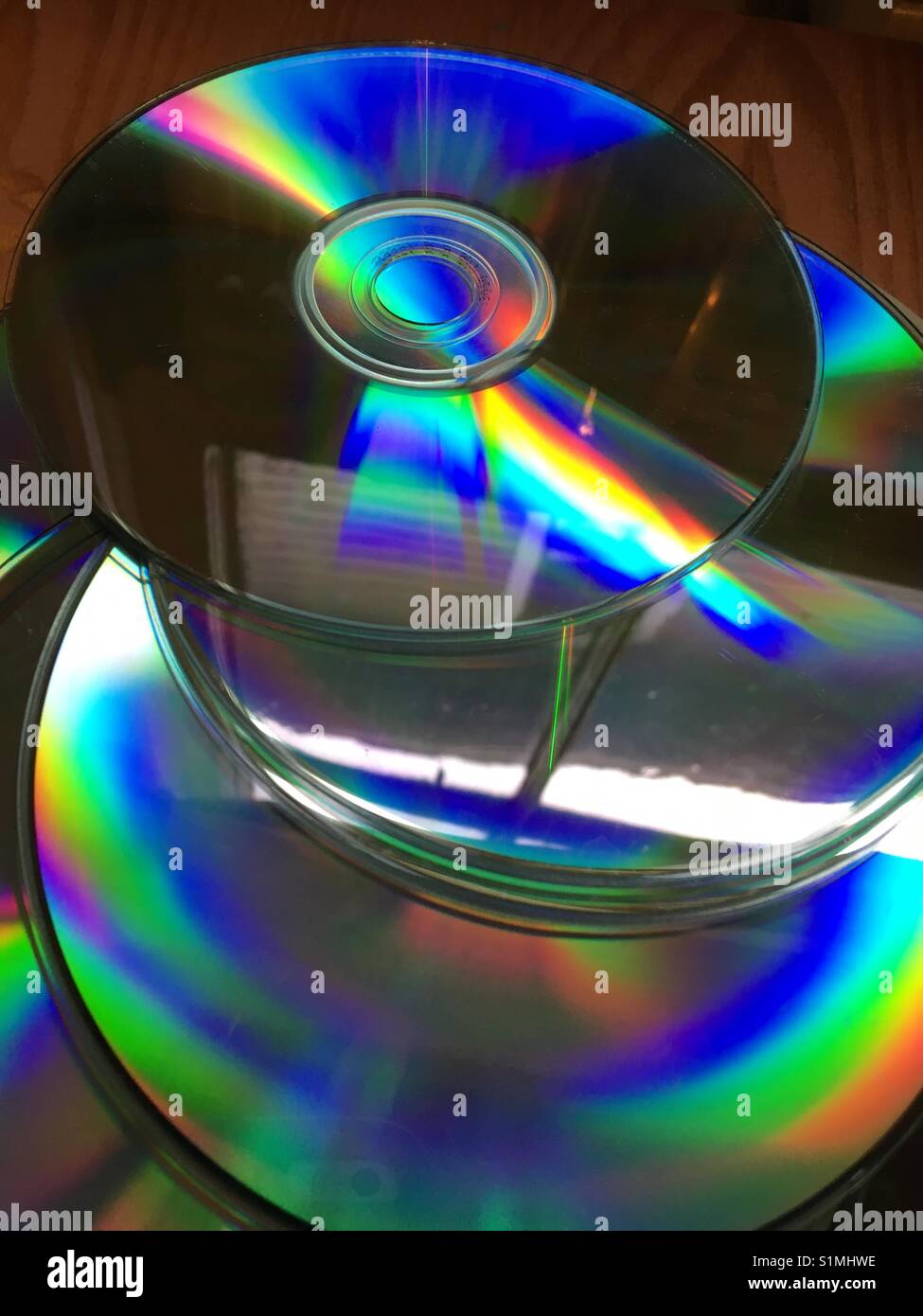 CDs encasing a reflection Stock Photo - Alamy