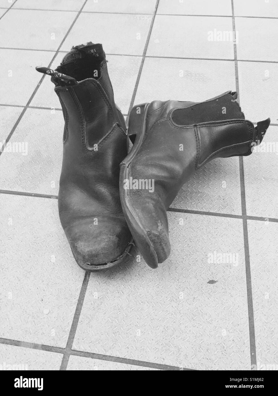 Old boots hi-res stock photography and images - Alamy