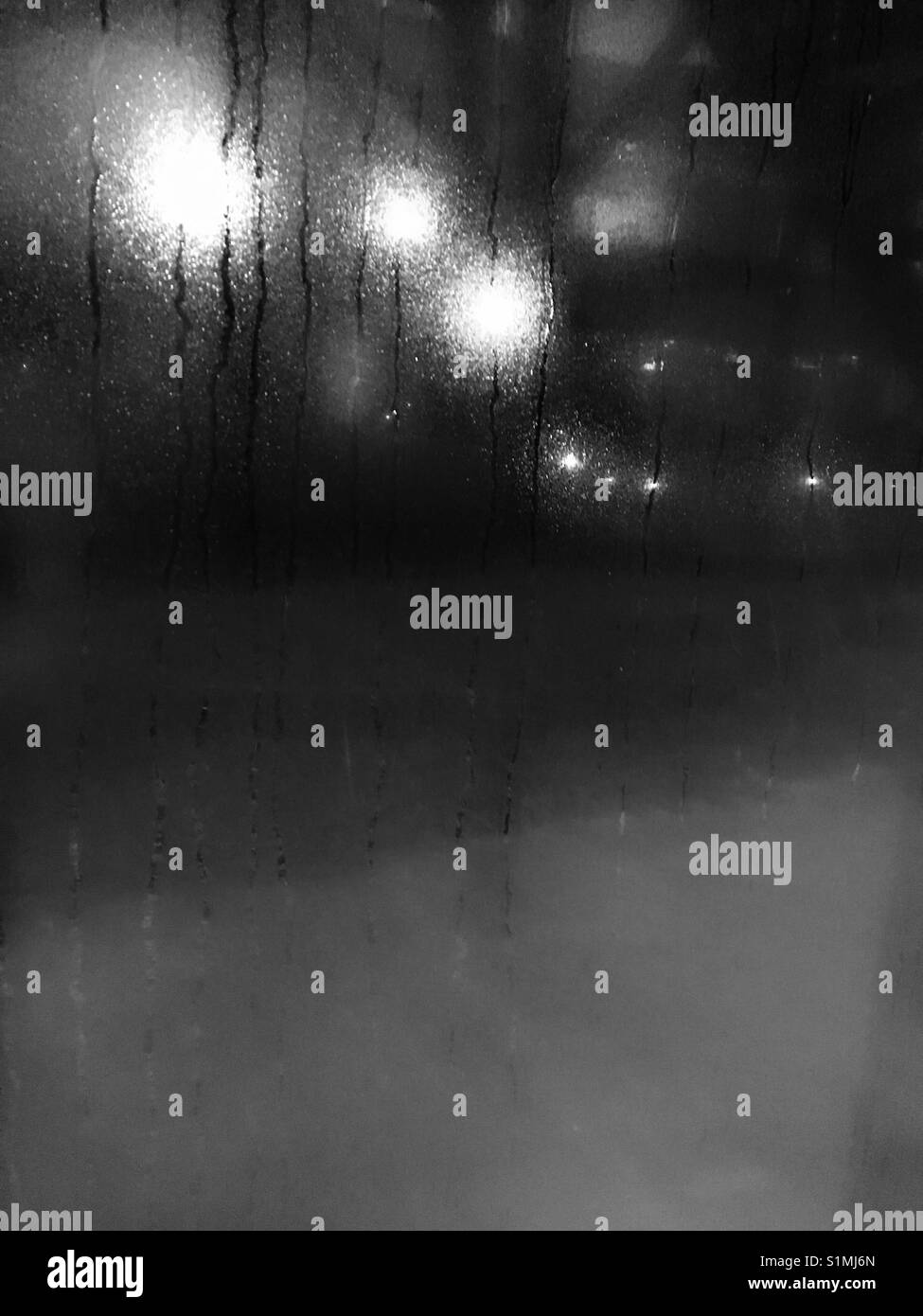 Wet window pane Stock Photo - Alamy