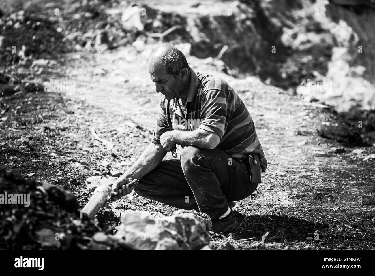 A refugee worker in Aida Camp in Bethlehem, Palestine Stock Photo - Alamy