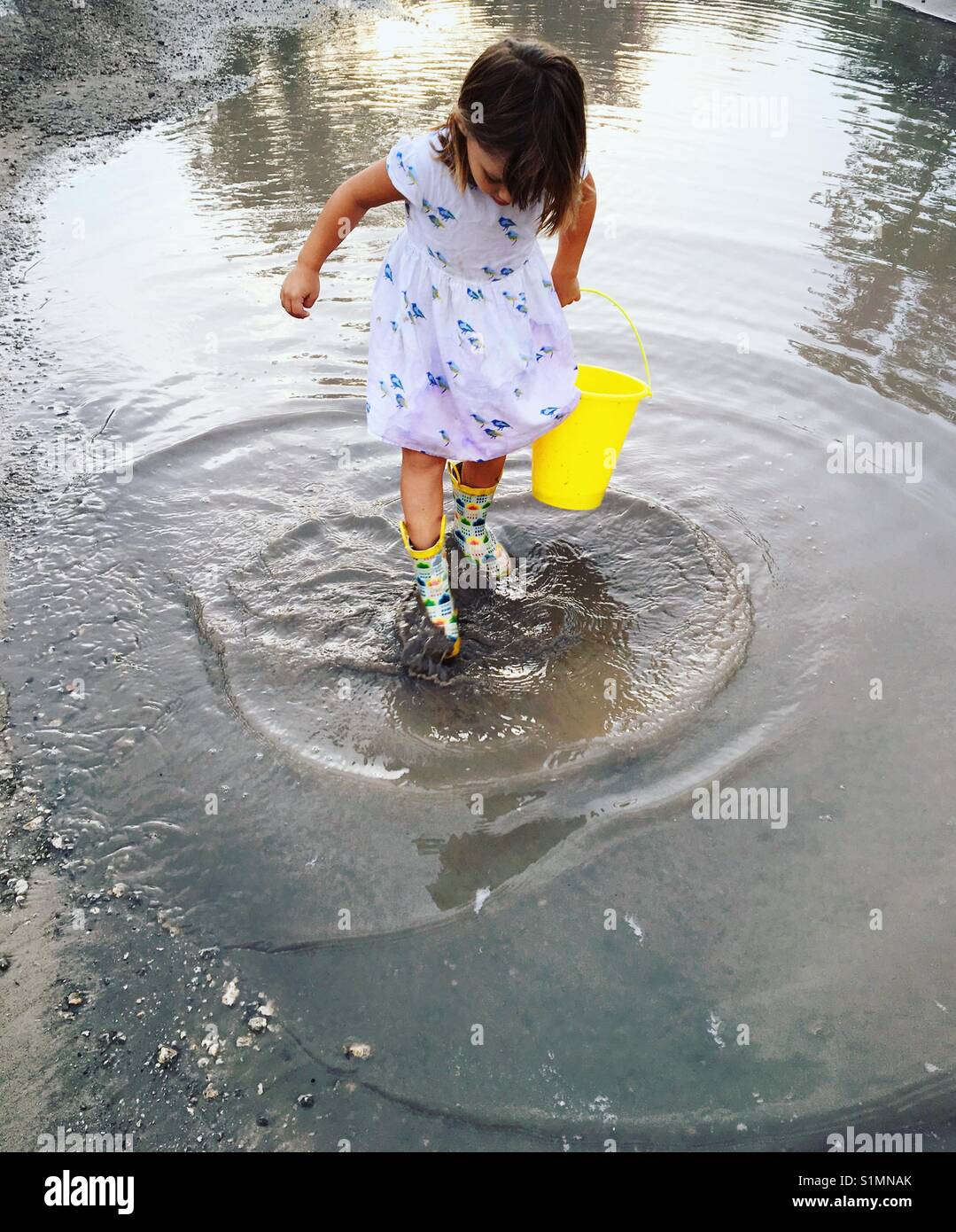 Toddler in mud puddle hi-res stock photography and images - Alamy