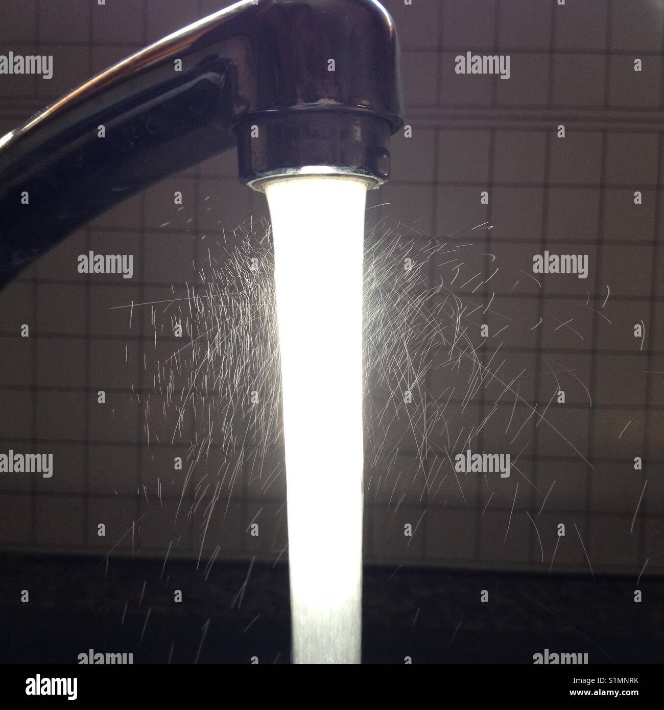Water tap with sunlight Stock Photo - Alamy