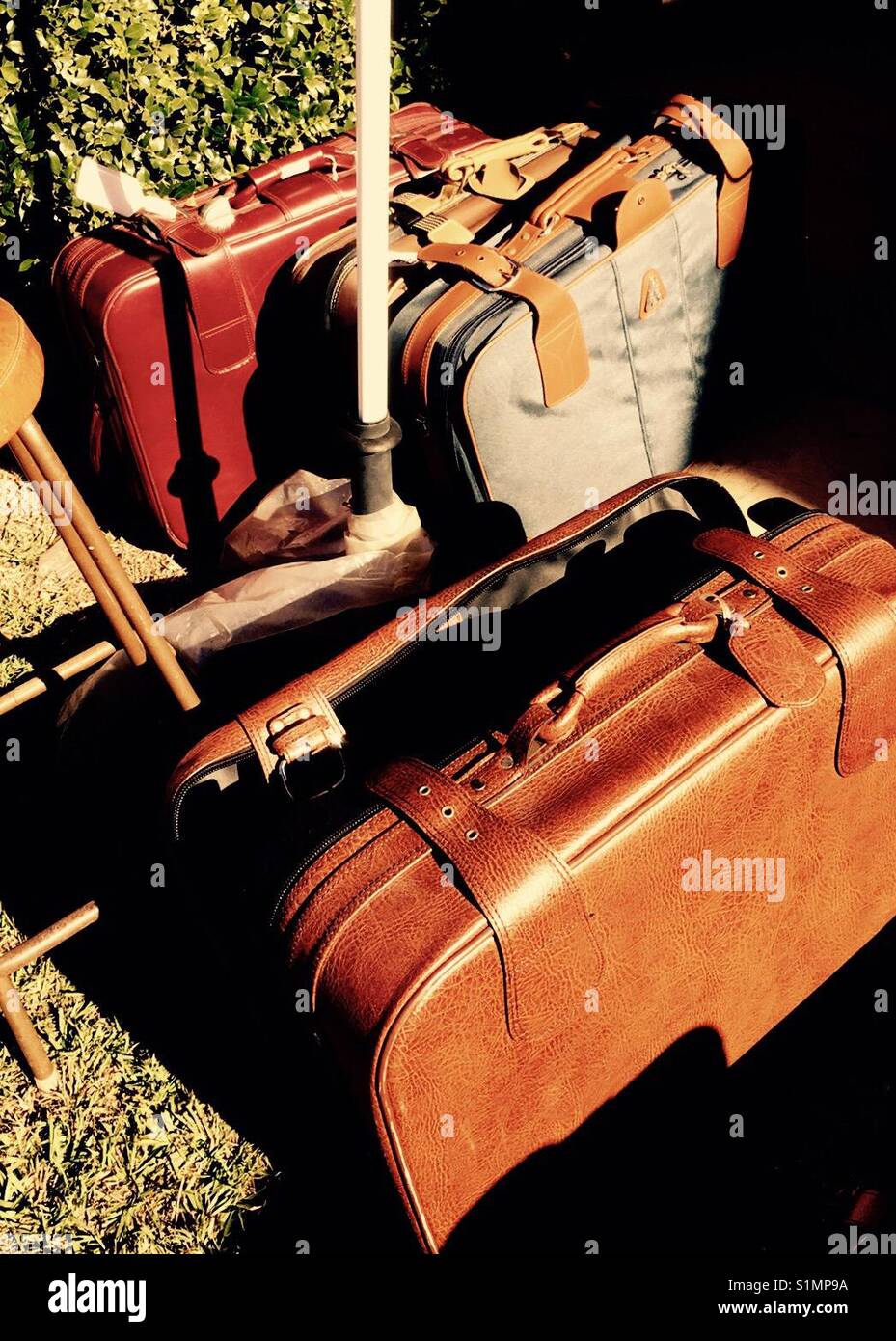 Vintage suit cases hi-res stock photography and images - Alamy