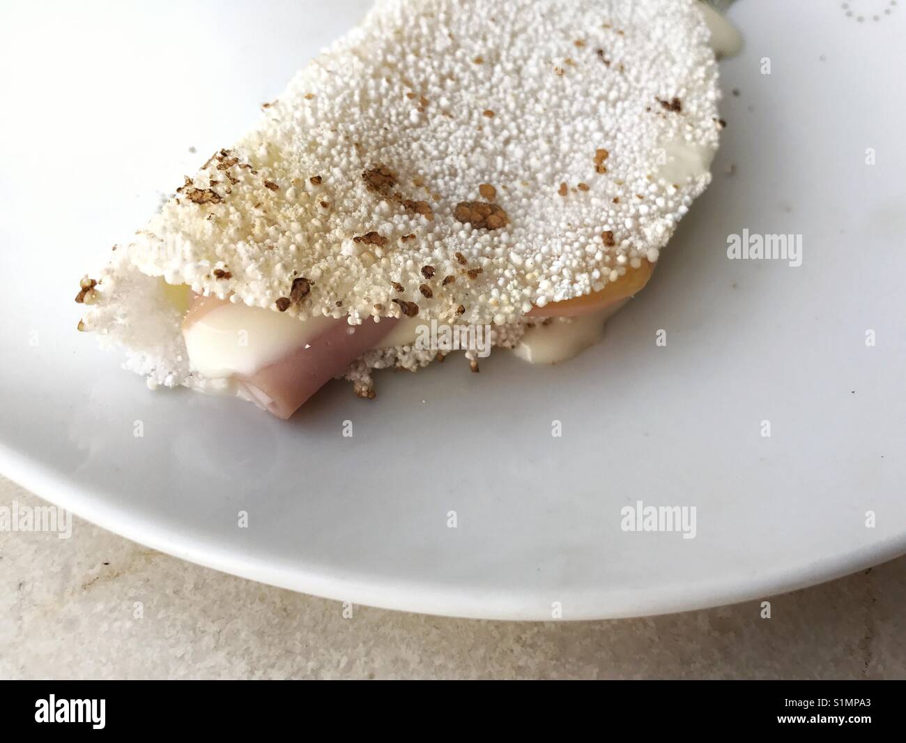 Brazilian food: Tapioca with ham and cheese Stock Photo - Alamy