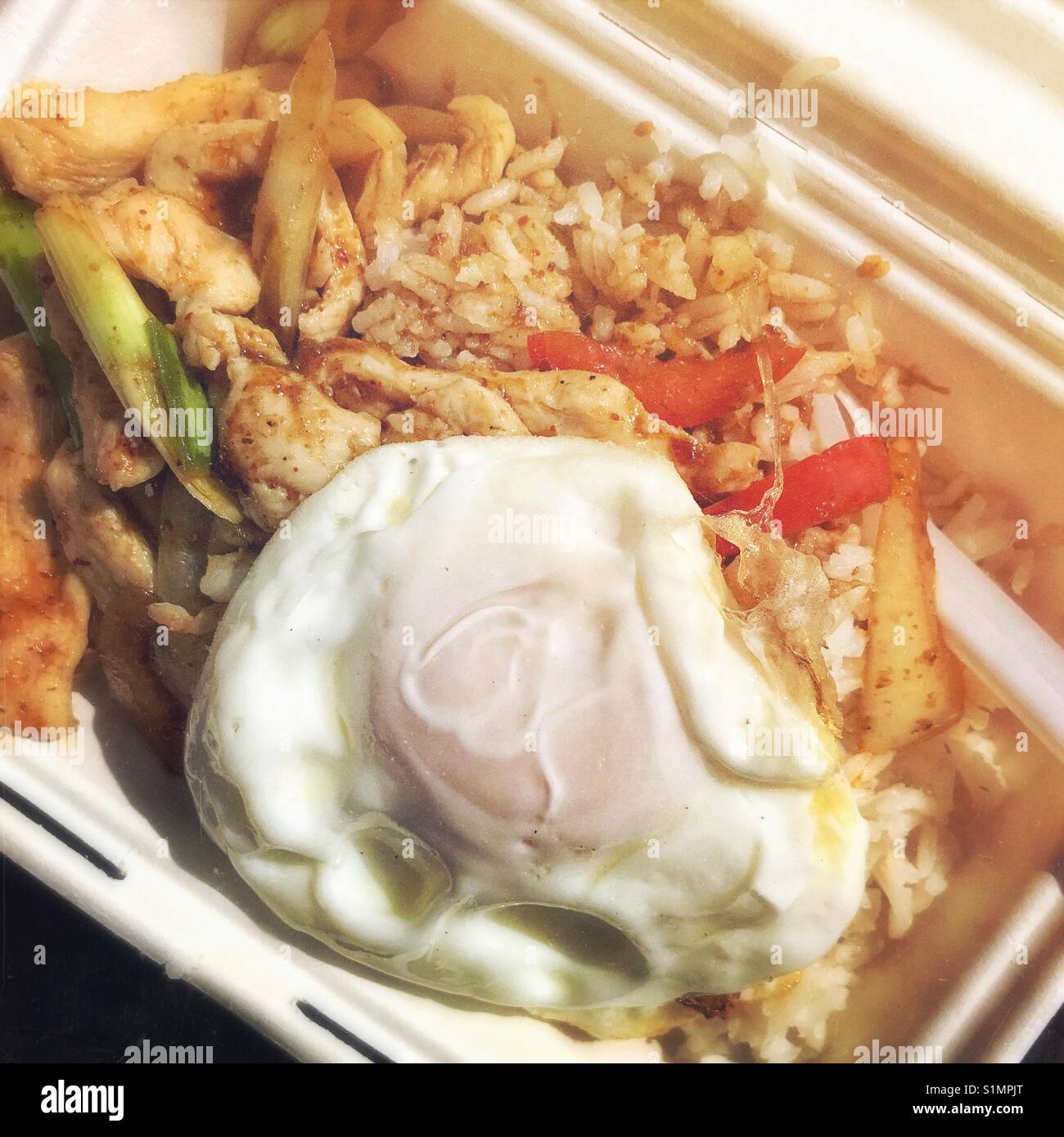 Thai takeaway fried rice with chicken and egg Stock Photo - Alamy
