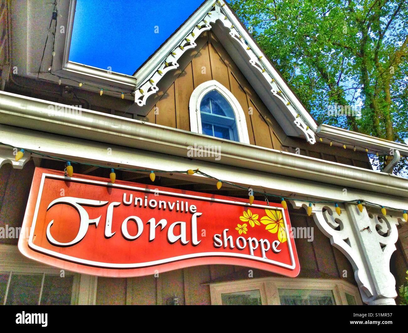 Floral shop sign Stock Photo - Alamy