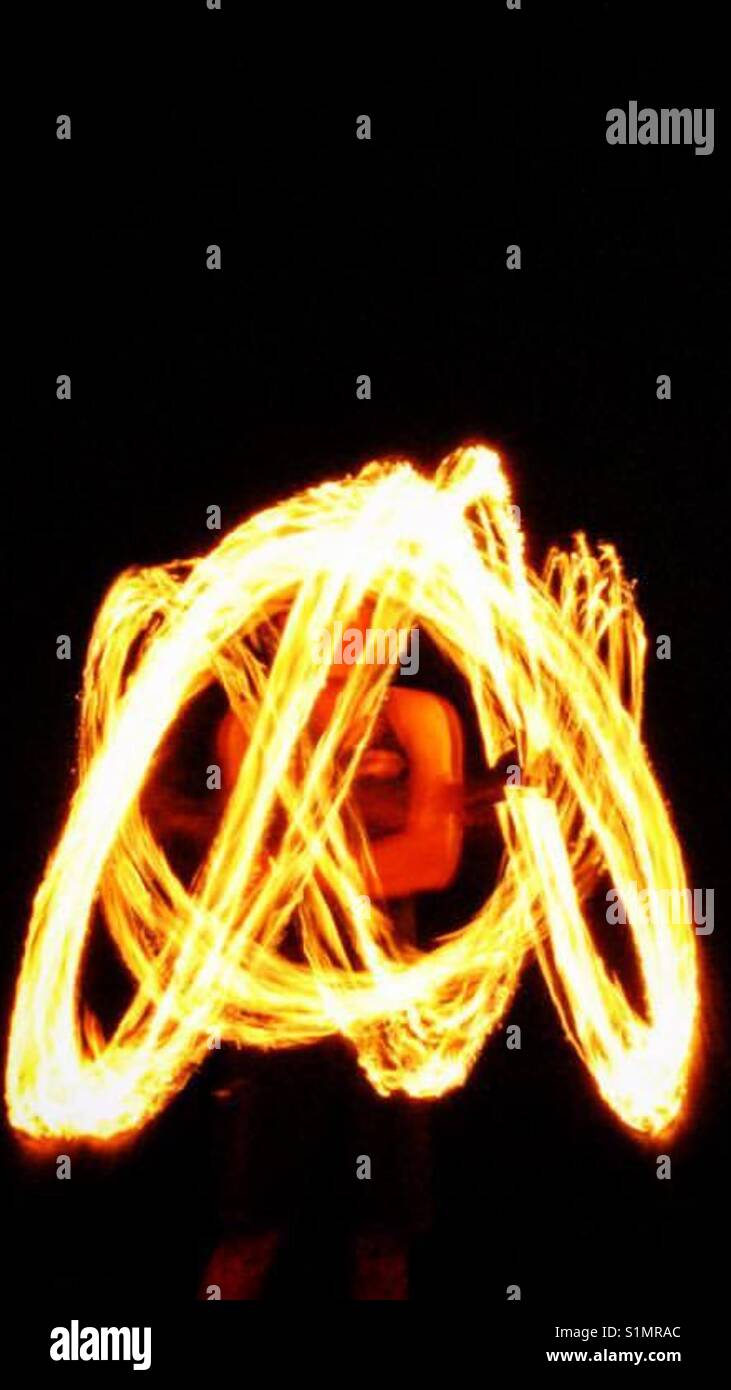 Fire trick hi-res stock photography and images - Alamy