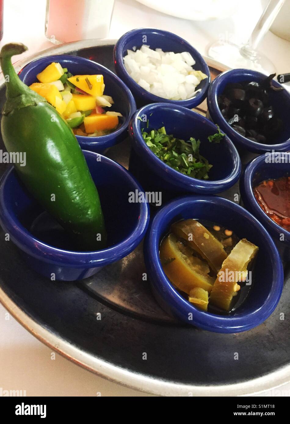 Condiment tray at Mexican restaurant, USA Stock Photo - Alamy