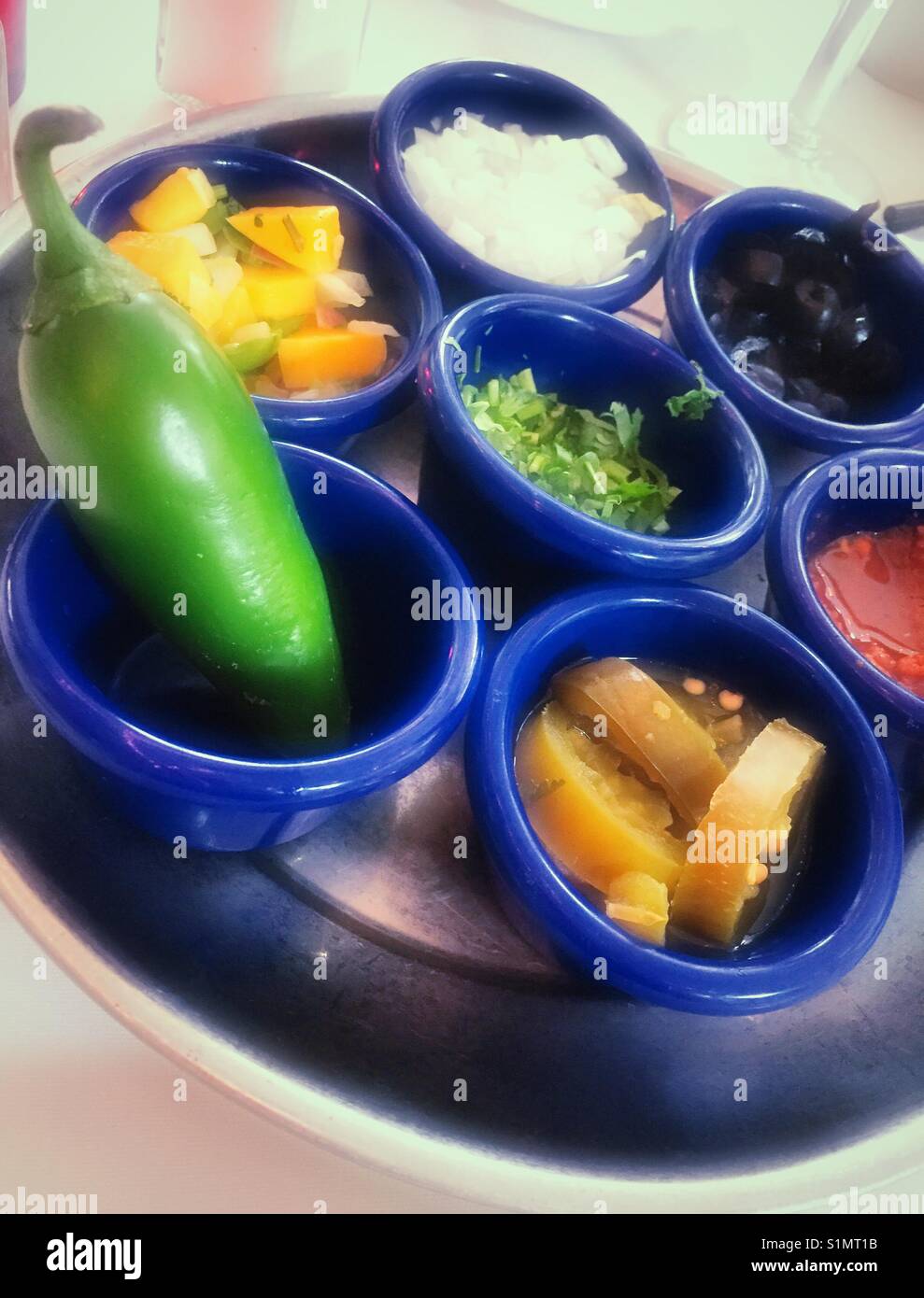 Condiment and relish tray at a Mexican restaurant, USA Stock Photo - Alamy