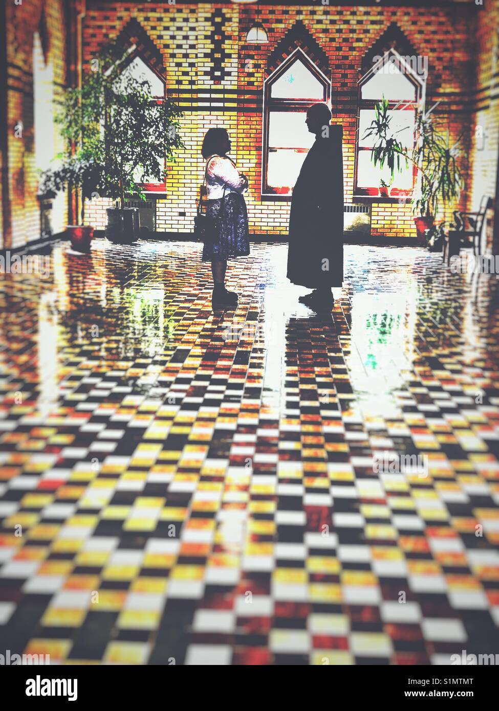 Monk and woman talking Stock Photo - Alamy