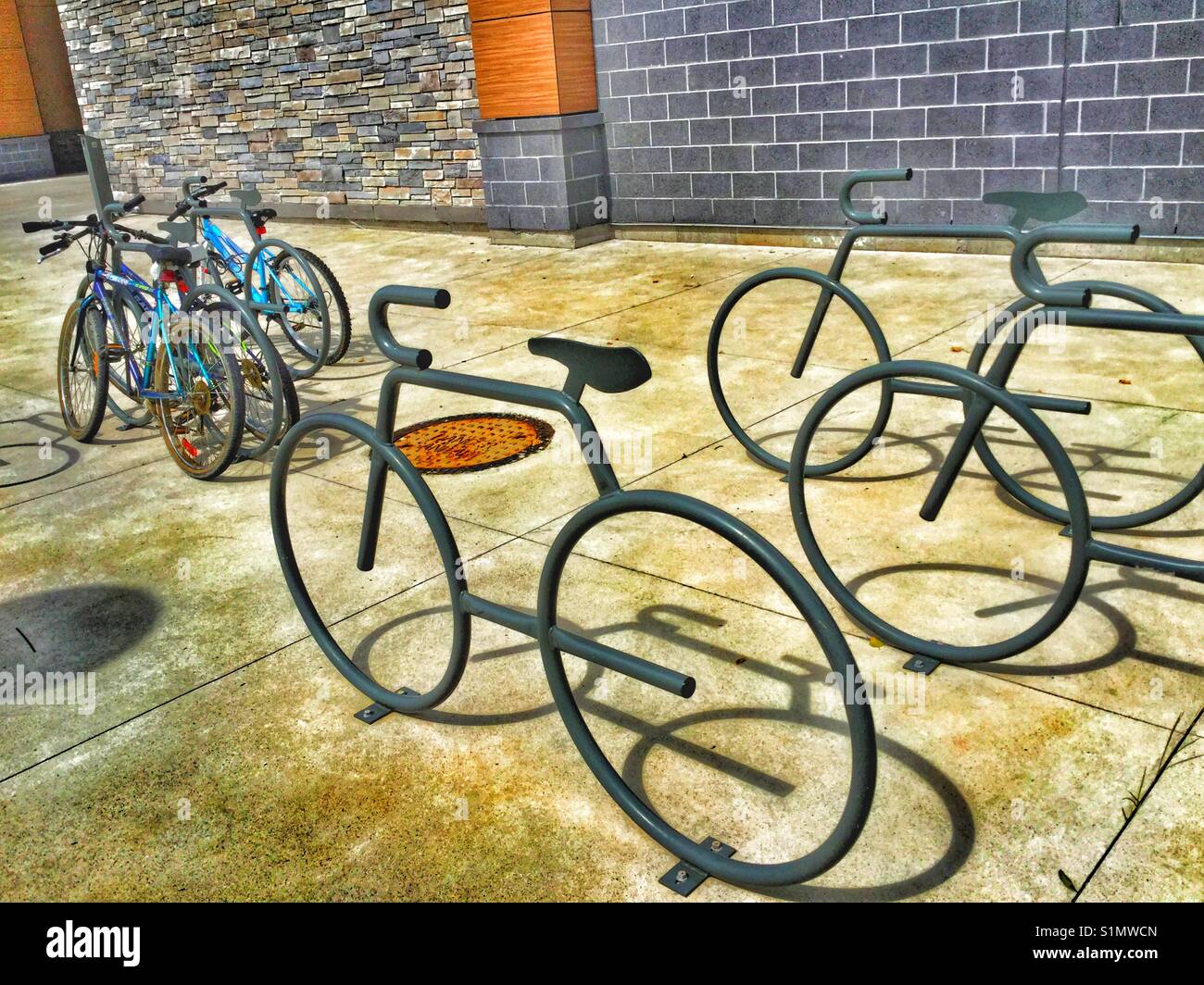 Bikes as bike stands Stock Photo - Alamy