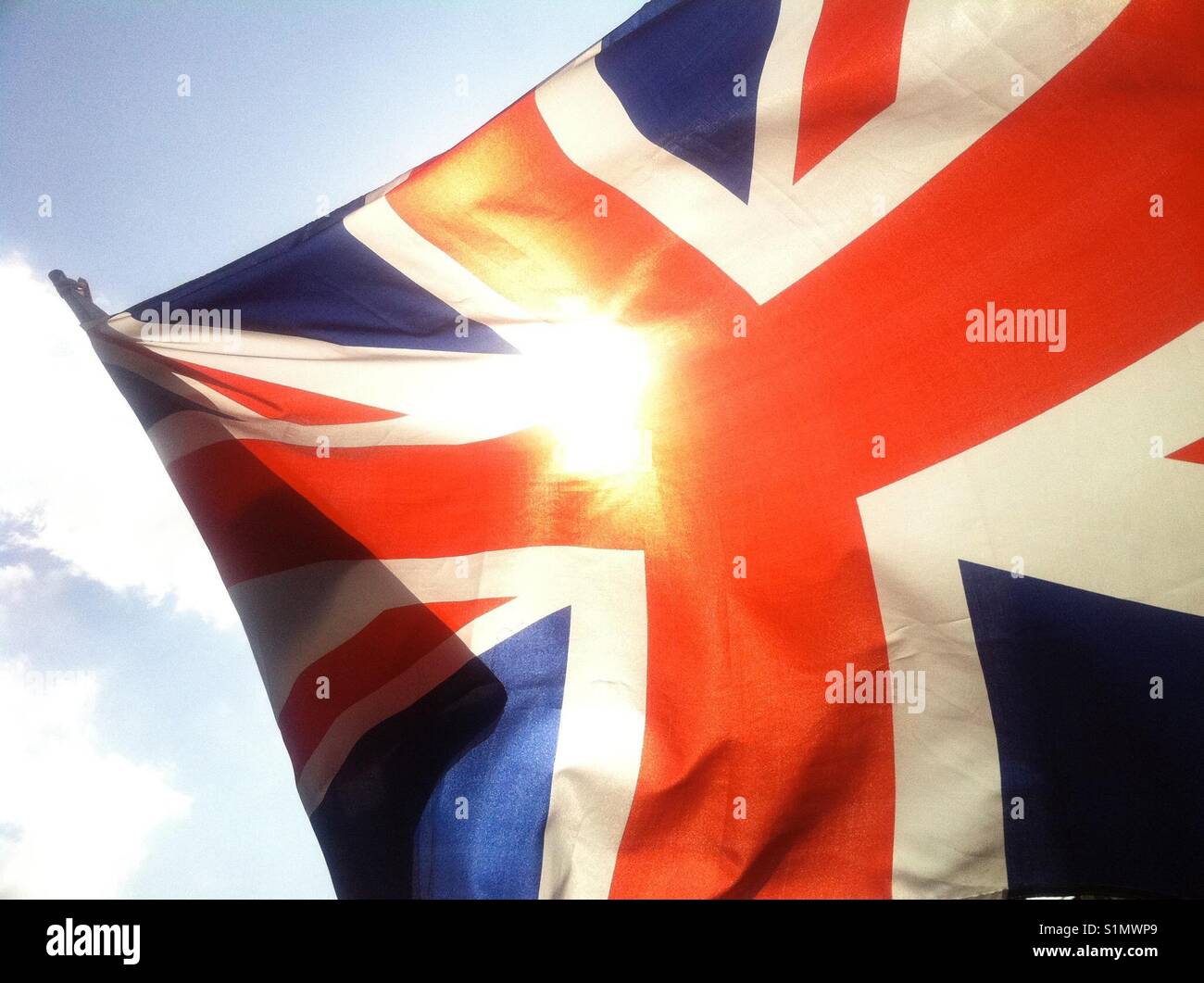 Sun backlit union flag Stock Photo - Alamy