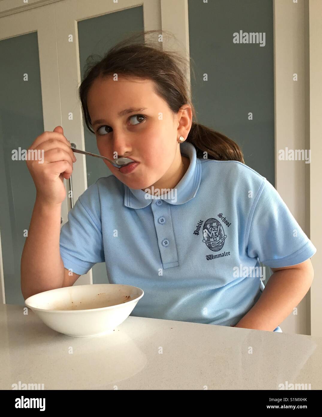 Little child spoon eating hi-res stock photography and images - Alamy