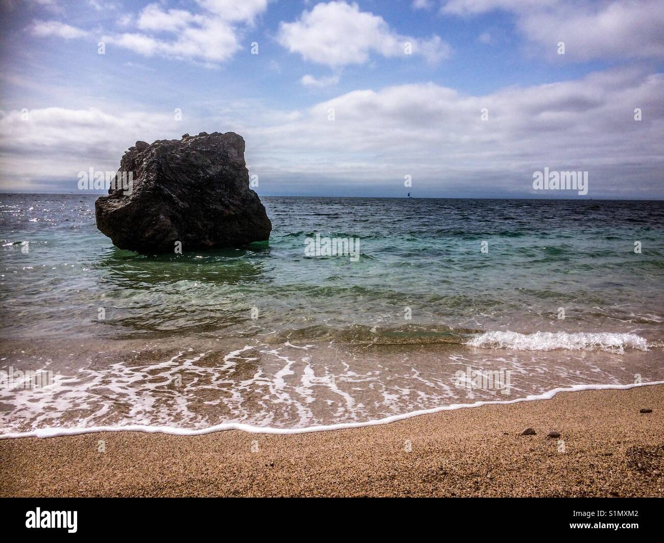 Lone rock in water hi-res stock photography and images - Alamy