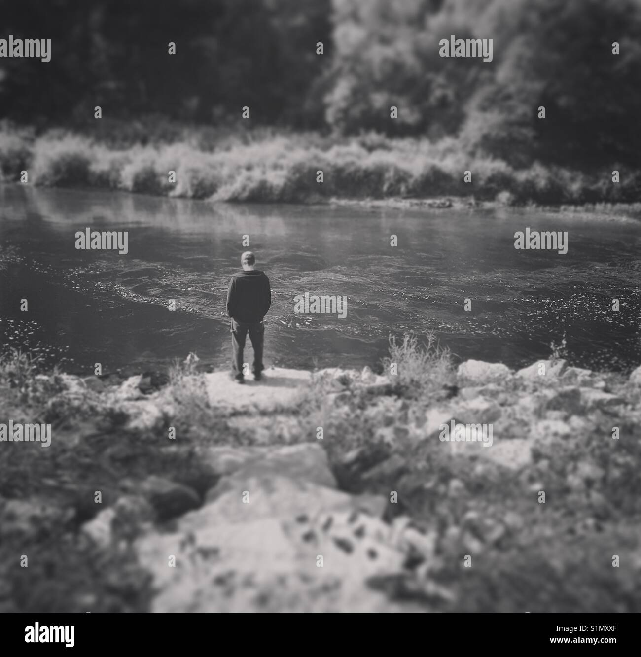 Person contemplating river hi-res stock photography and images - Alamy