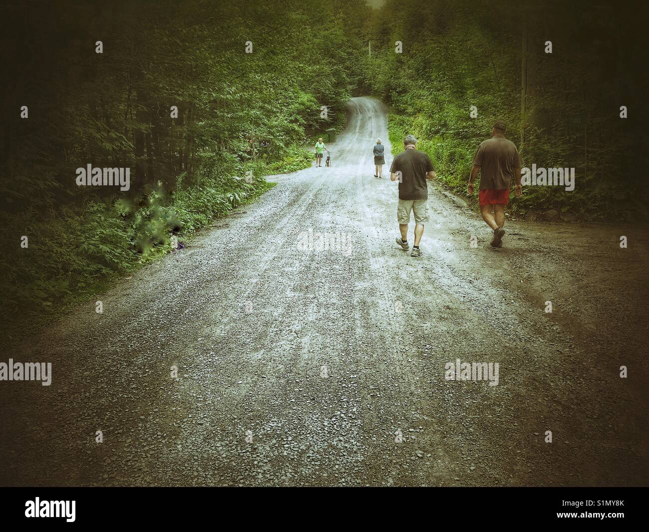 People walking country road hi-res stock photography and images - Alamy