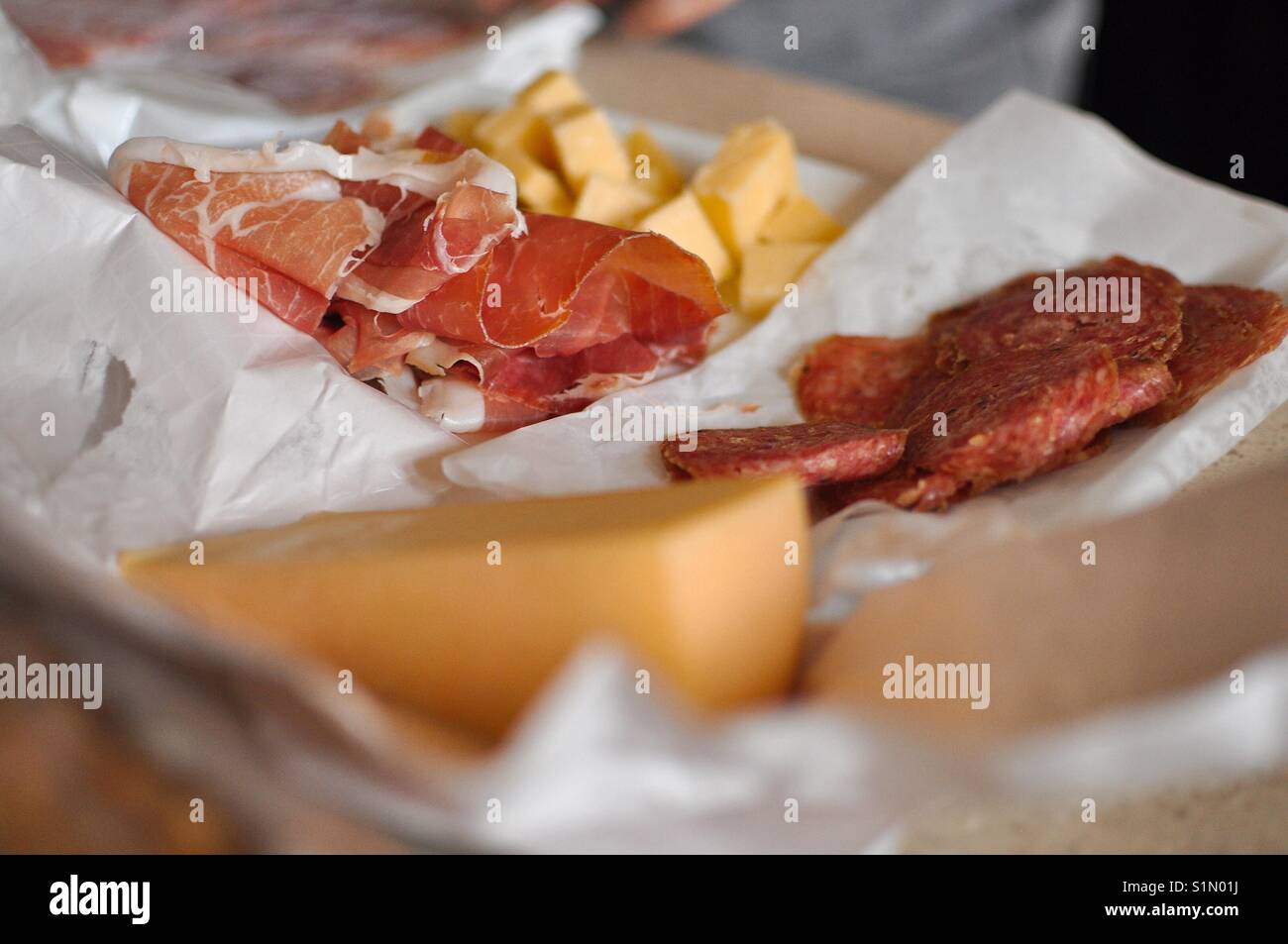 Little cheese and charcuterie to start any evening Stock Photo - Alamy
