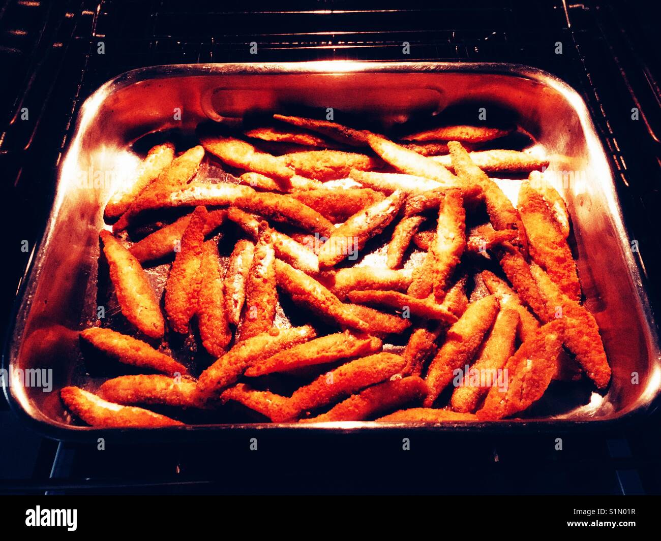 Battered Whitebait oven cooked Stock Photo - Alamy