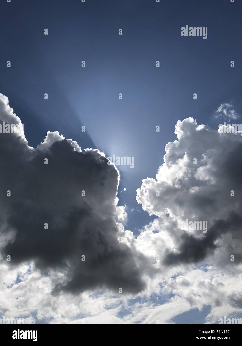 Dark clouds sunshine hi-res stock photography and images - Alamy