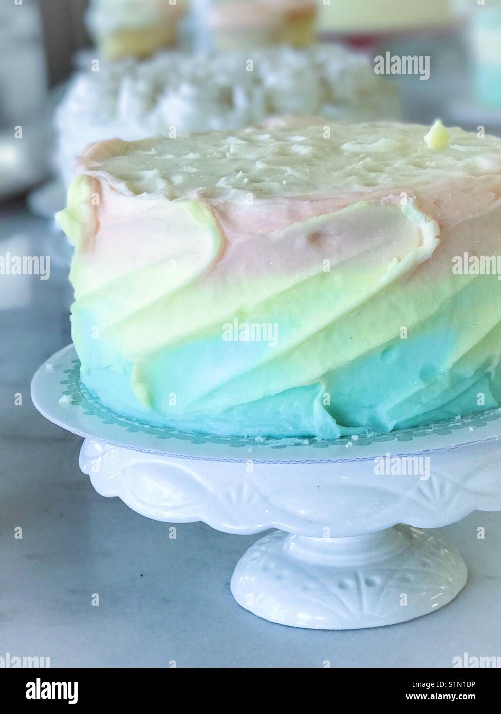 Cake with pastel icing Stock Photo - Alamy