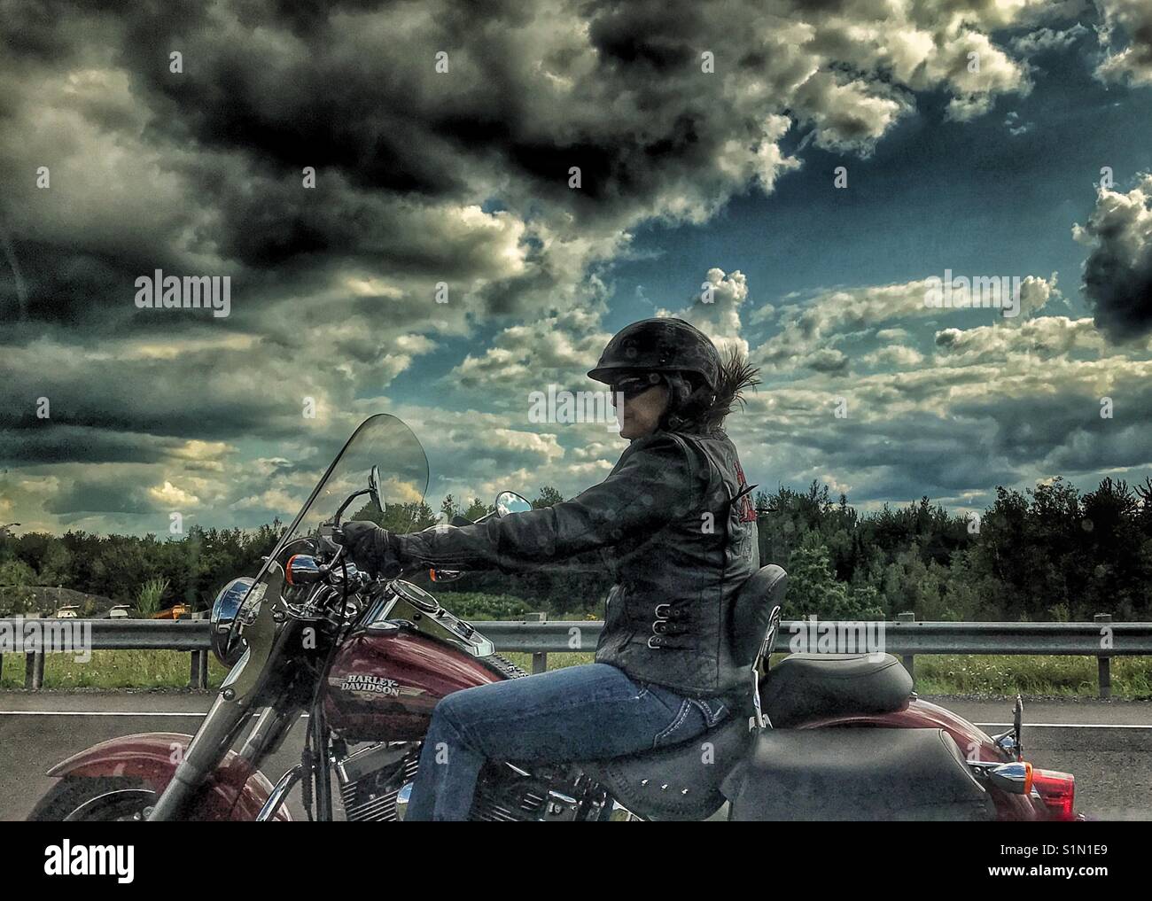 Woman motorcyclist hi-res stock photography and images - Alamy