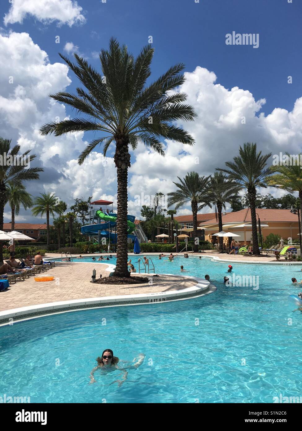 Swimming pool in the sun Stock Photo - Alamy