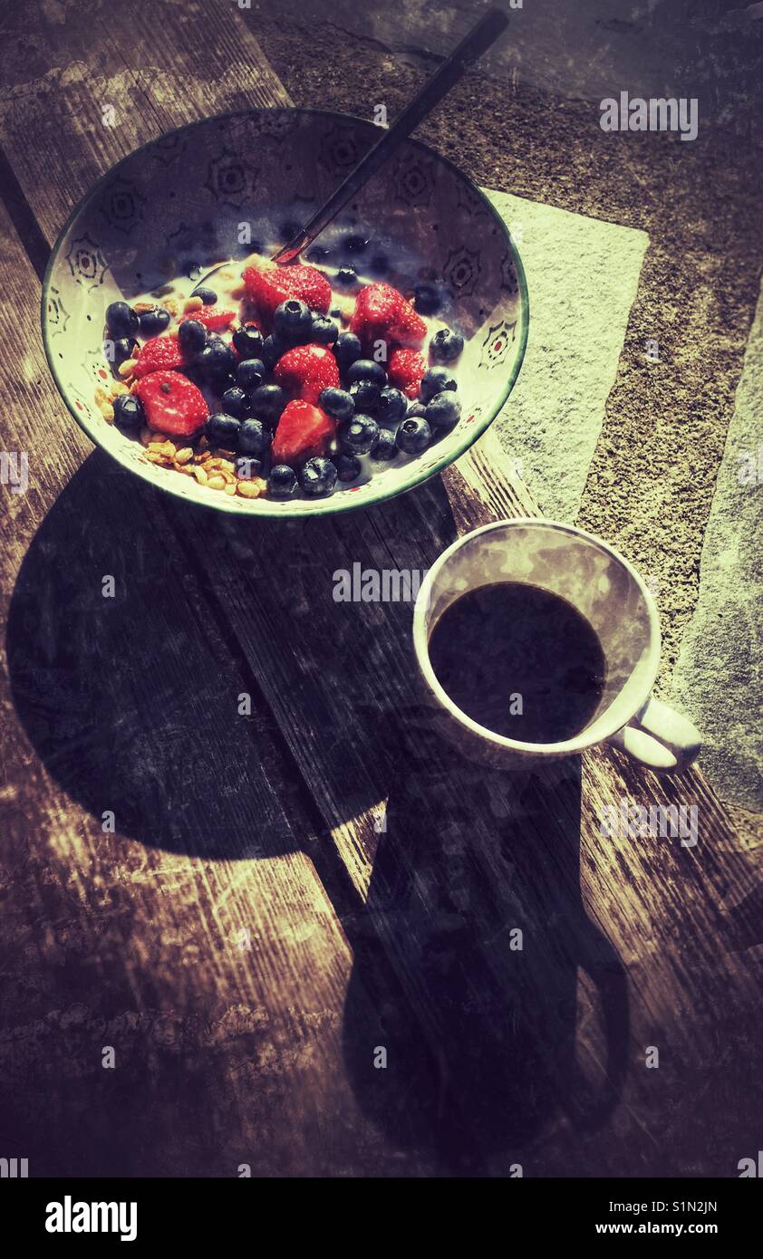 Breakfast; serial, beries and coffee Stock Photo - Alamy