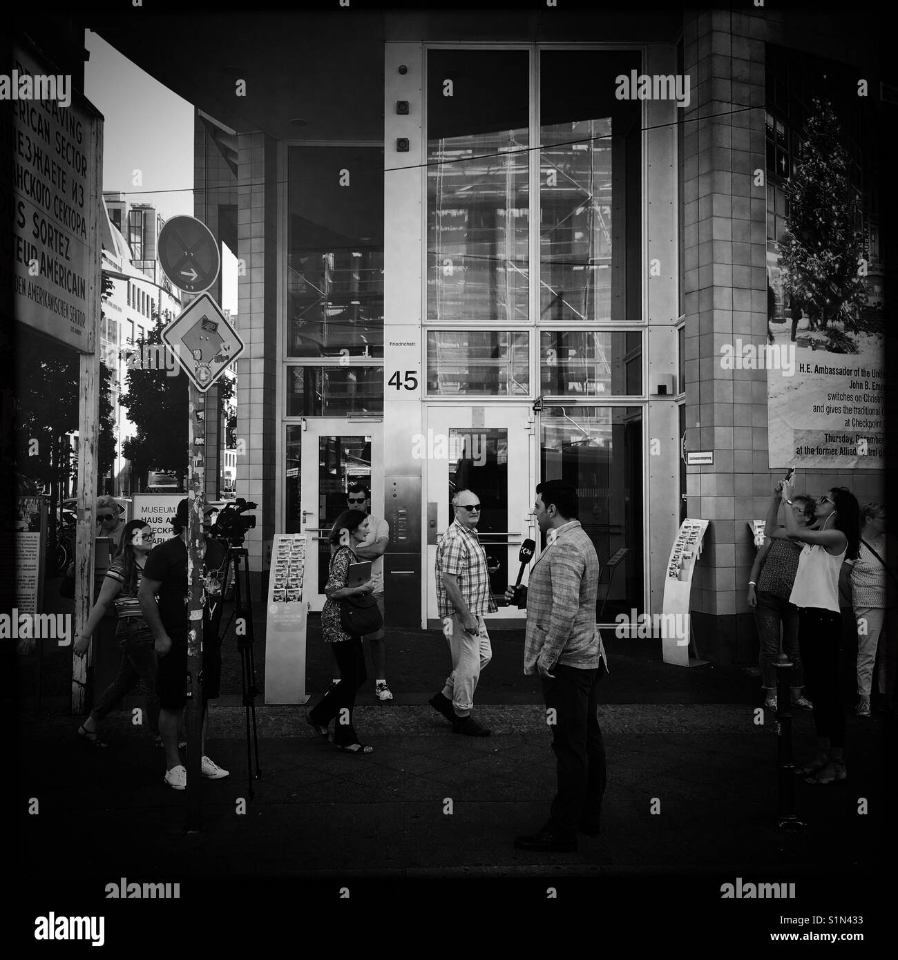 TV Crew at Checkpoint Charlie Berlin Stock Photo - Alamy